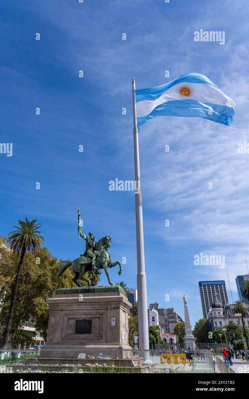 A large Argentine flag flies over the statue of General Manual Belgrano ...