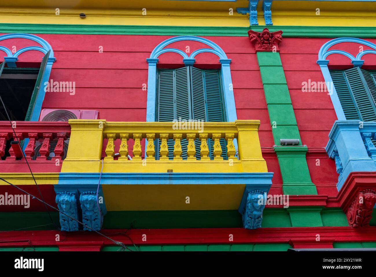 A colorfully painted balcony on a building on Magallanes Street in ...