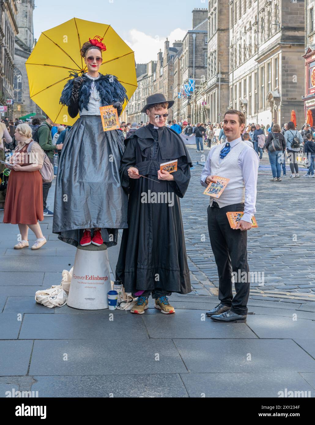 Edinburgh Festival Fringe performers handing out advertising leaflets ...