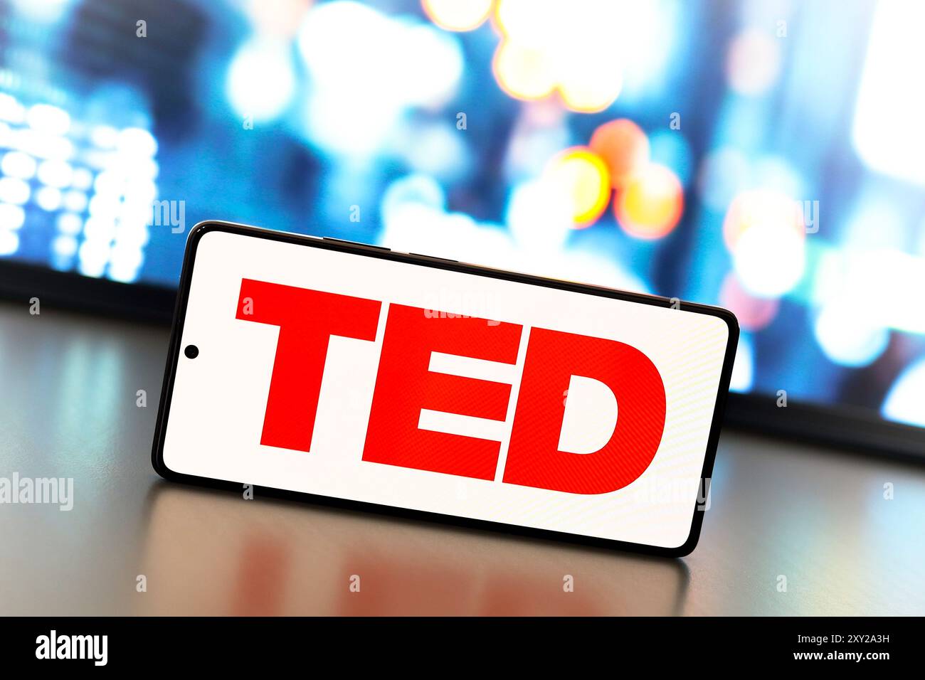 In this photo illustration, the TED logo is displayed on a smartphone ...