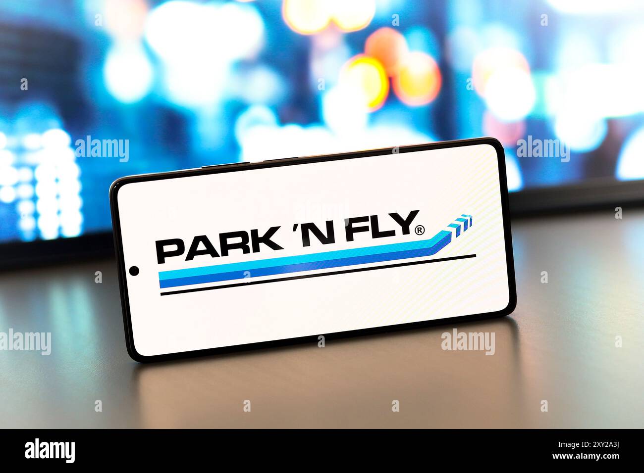 In this photo illustration, the Park 'N Fly logo is displayed on a ...
