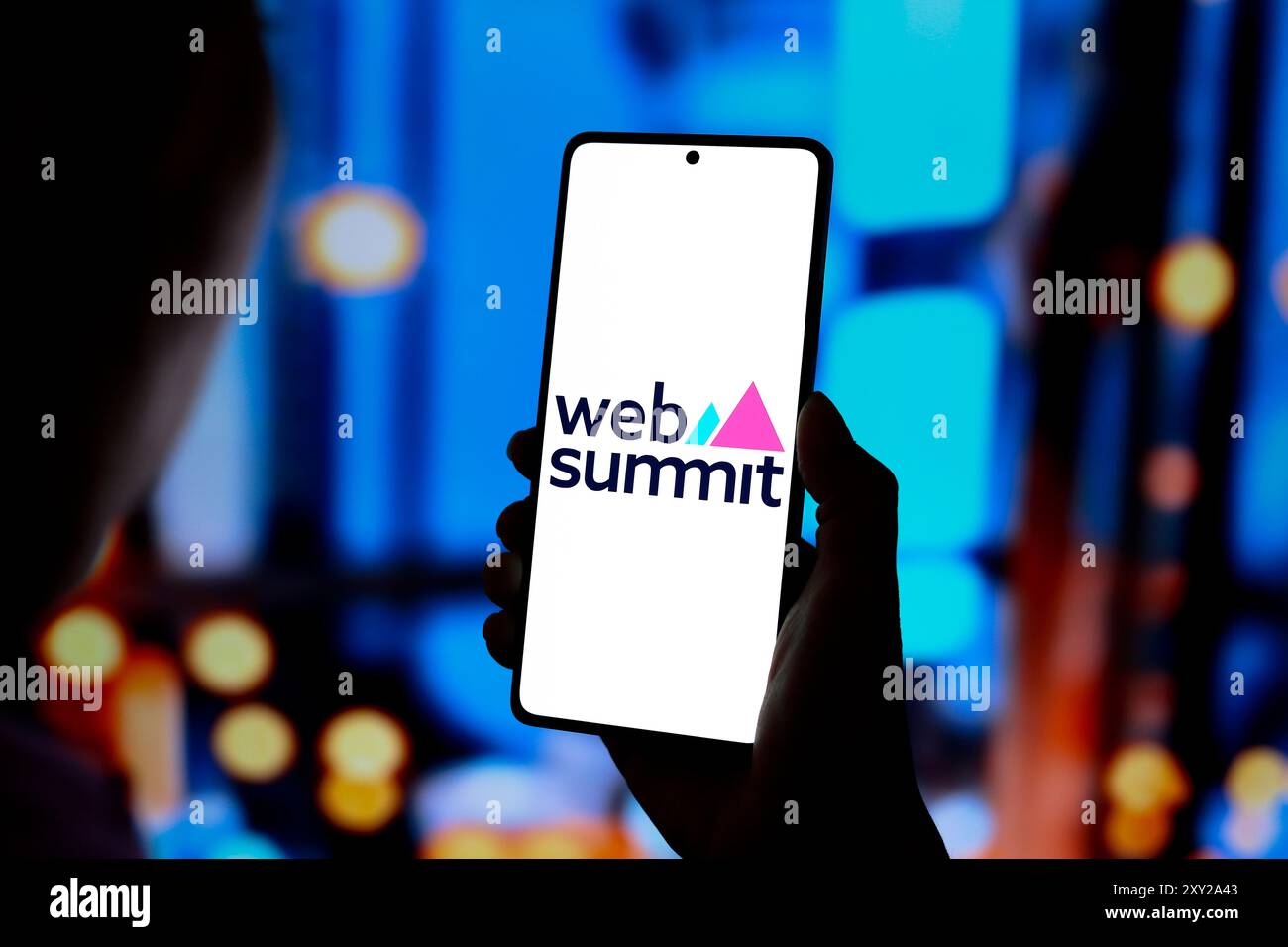 In this photo illustration, the Web Summit logo is displayed on a ...