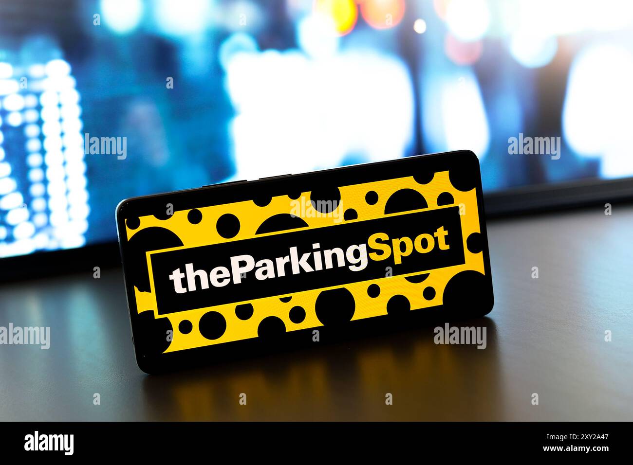 In this photo illustration, the Parking Spot logo is displayed on a ...