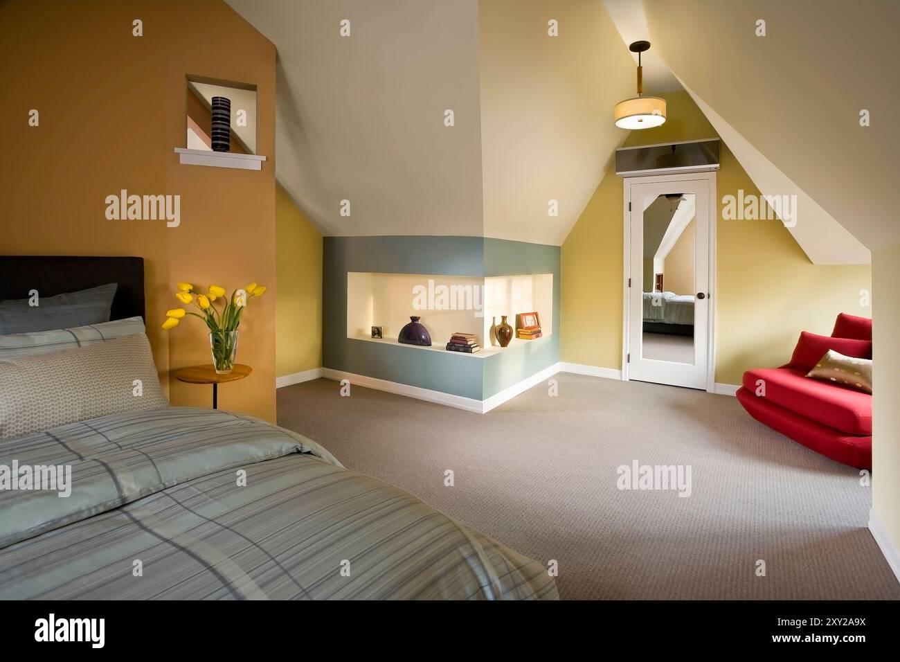 Colorful bedroom with notch in wall for displaying art work Stock Photo ...