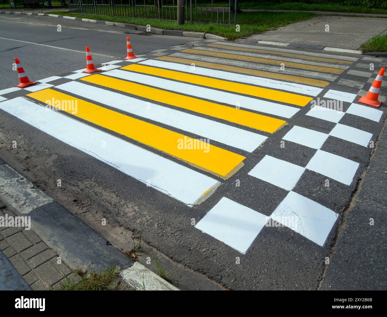 Updating pedestrian crossing markings Stock Photo - Alamy