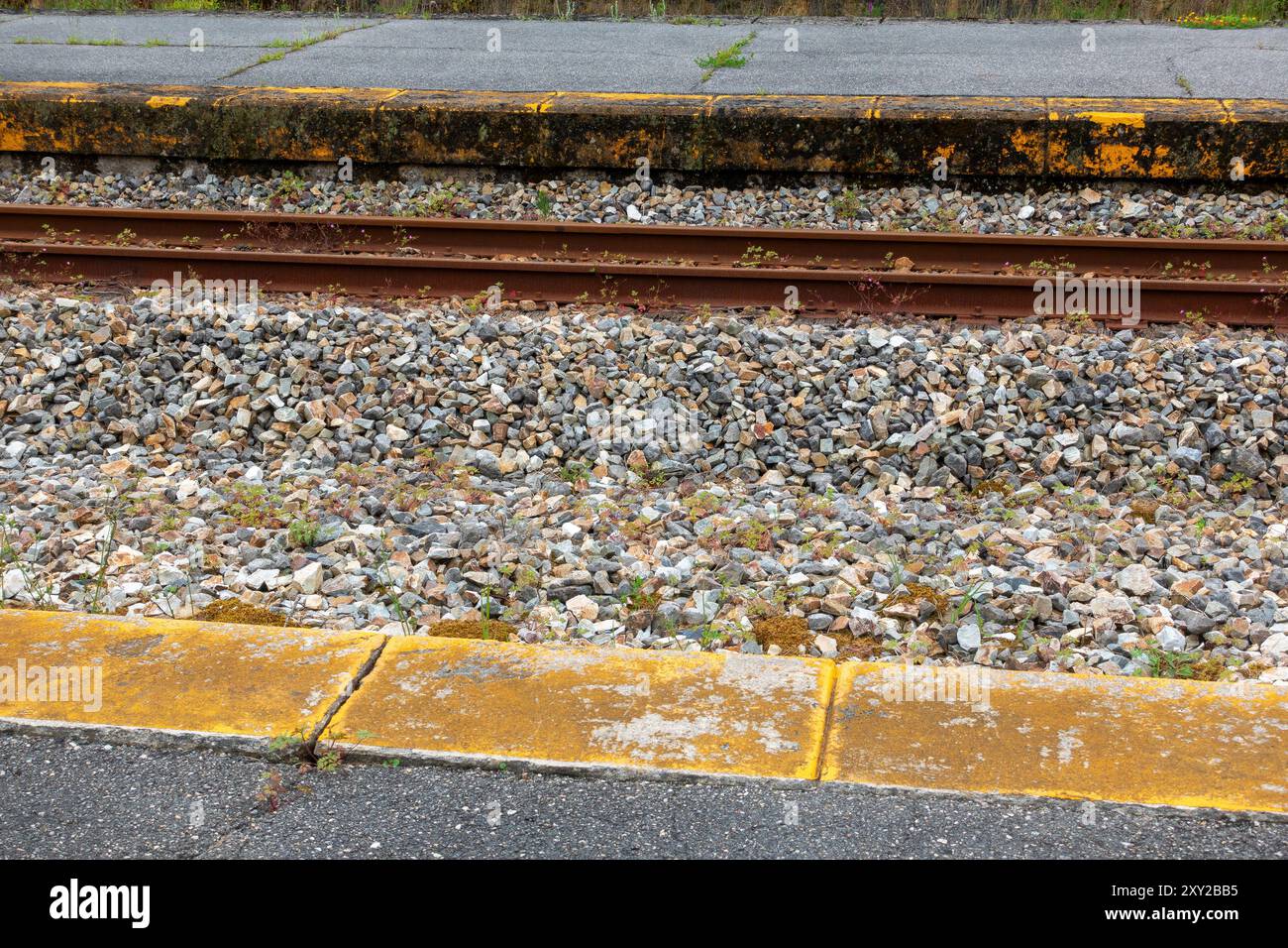 Railway station platform abstract with its weathered edges, rocky ...