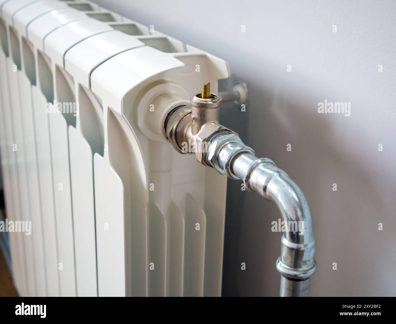 Heating radiator with stainless steel pipes Stock Photo - Alamy