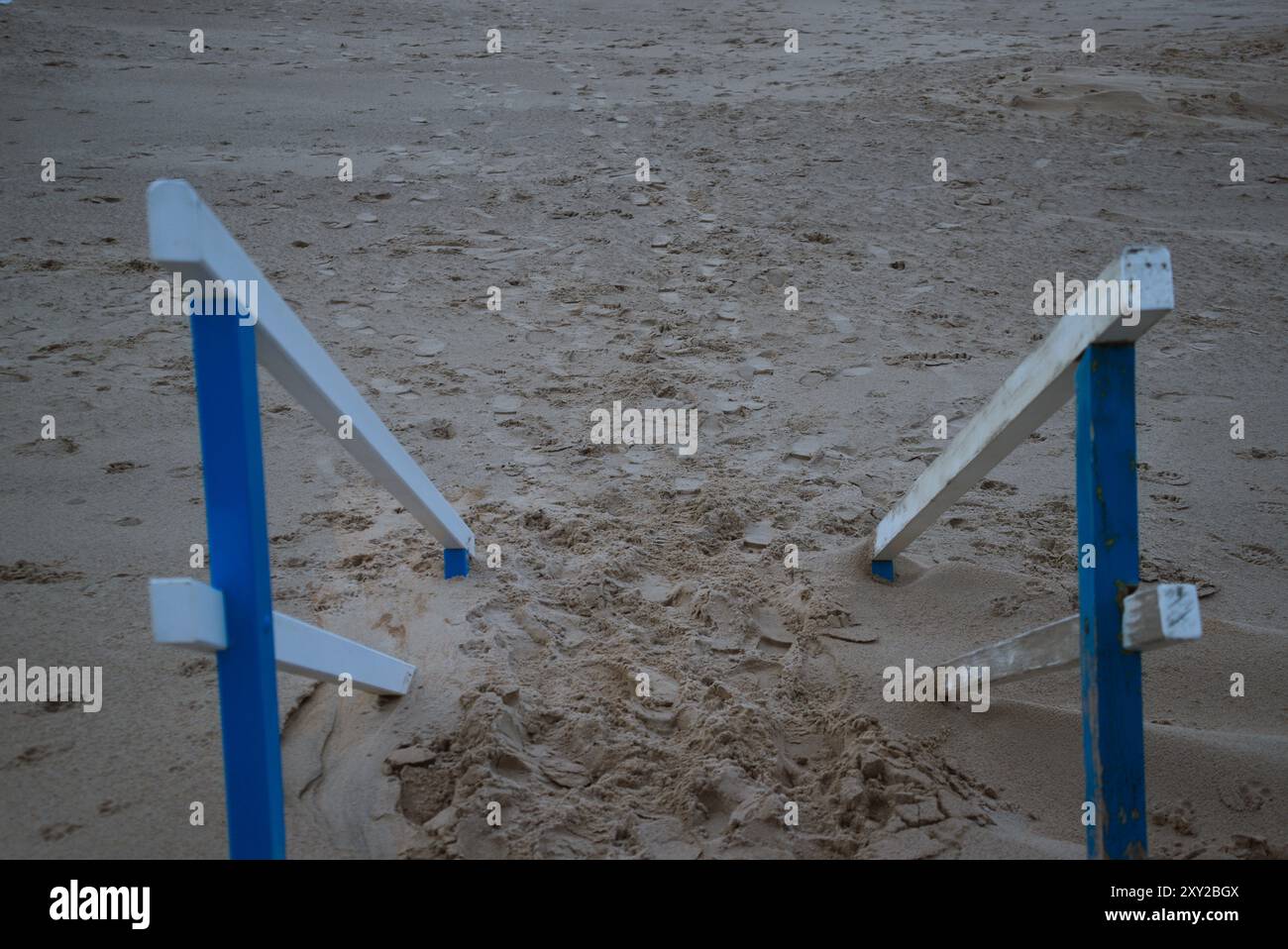 Steps Disappearing into Sand at the Beach Stock Photo - Alamy
