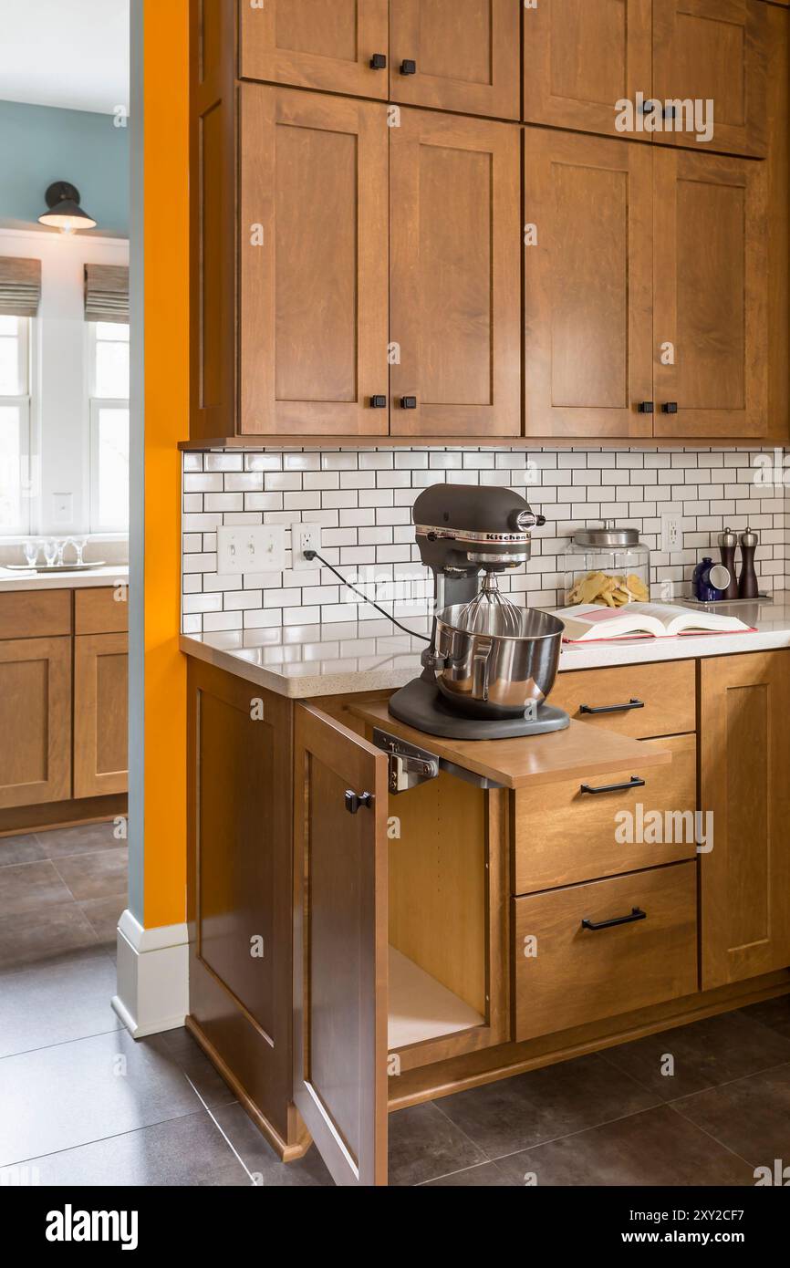 Electric mixer on pull-up platform that hides in cabinet Stock Photo ...