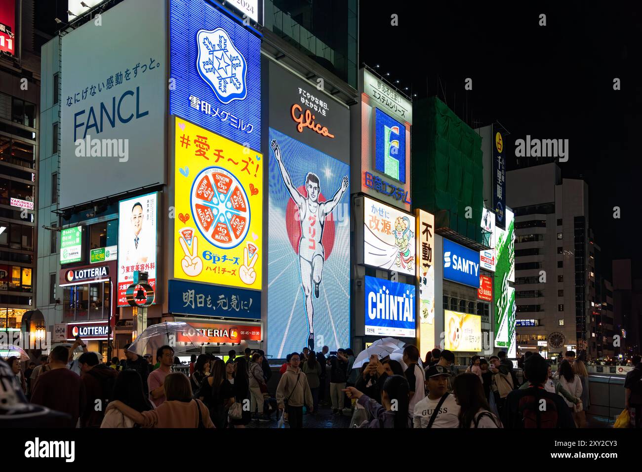 Osaka, Japan - 05.12.2024: The Glico Running Man neon sign in Dotombori ...