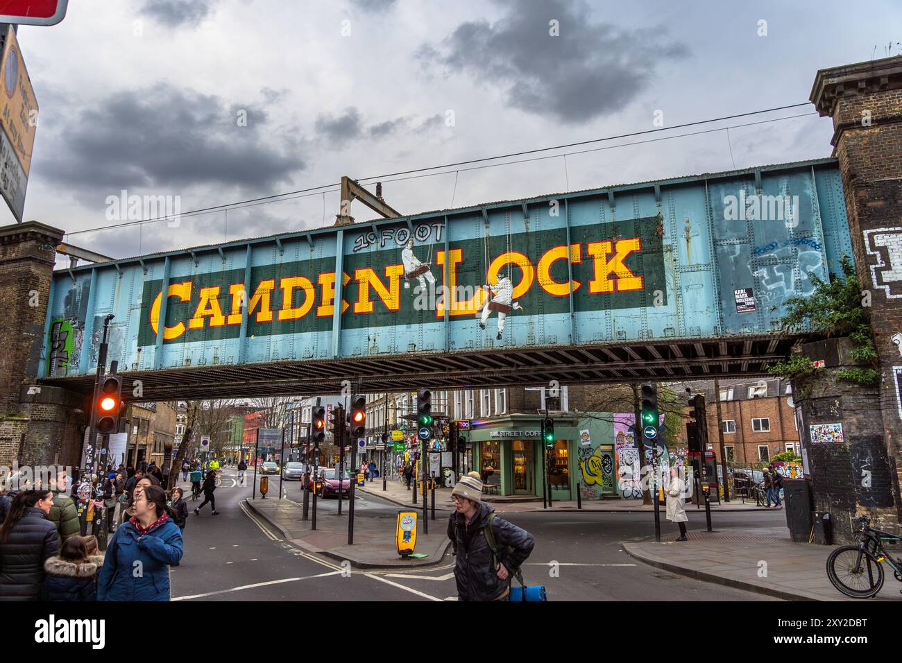 People and tourists walking under the legendary Camden Lock metal ...