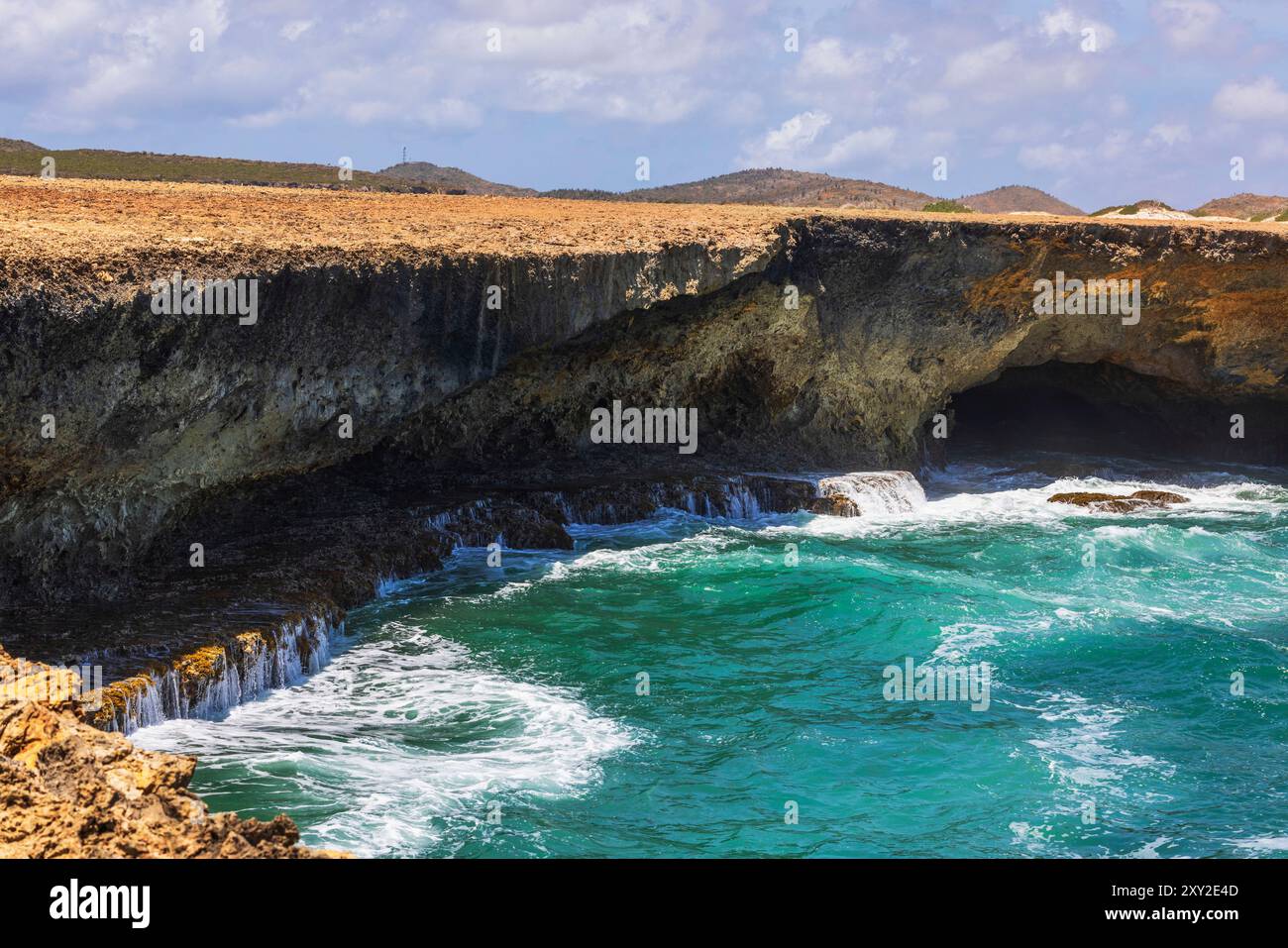 Rocky shore of Arikok National Park in Aruba, where Caribbean waves ...