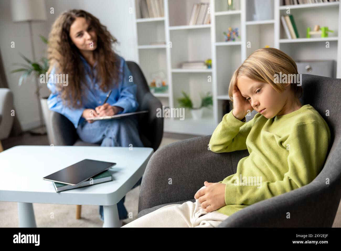 Blonde boy demonstrating negative attitude to speech therapy Stock ...