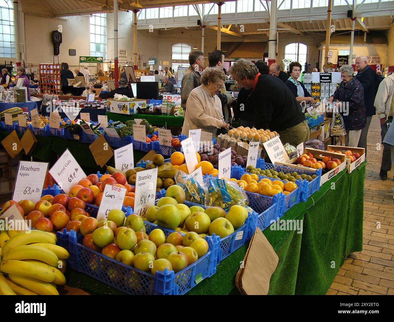 A stall selling fruit , vegetables and eggs in the Barnstaple pannier ...