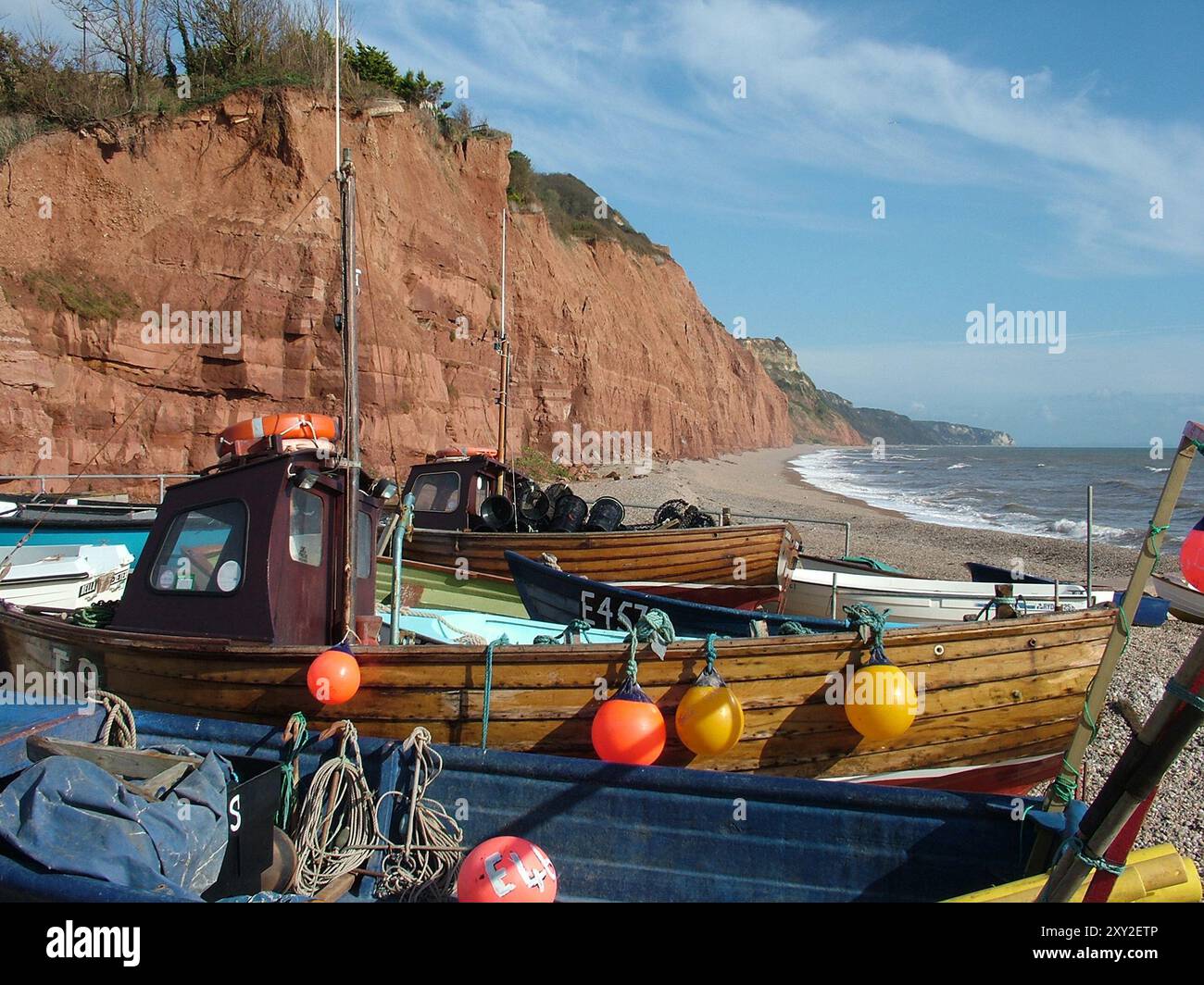 Fishing boats in 2004 drawn up on the pebble and shingle beach below ...