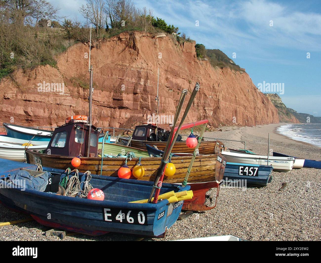 Fishing boats in 2004 drawn up on the pebble and shingle beach below ...