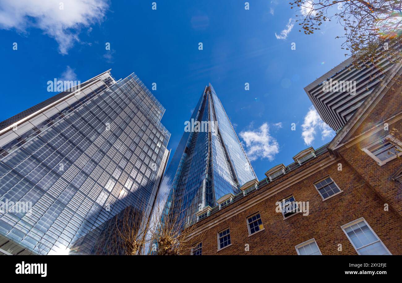 Low angle view of modern pyramid shaped glass skyscraper The Shard with ...