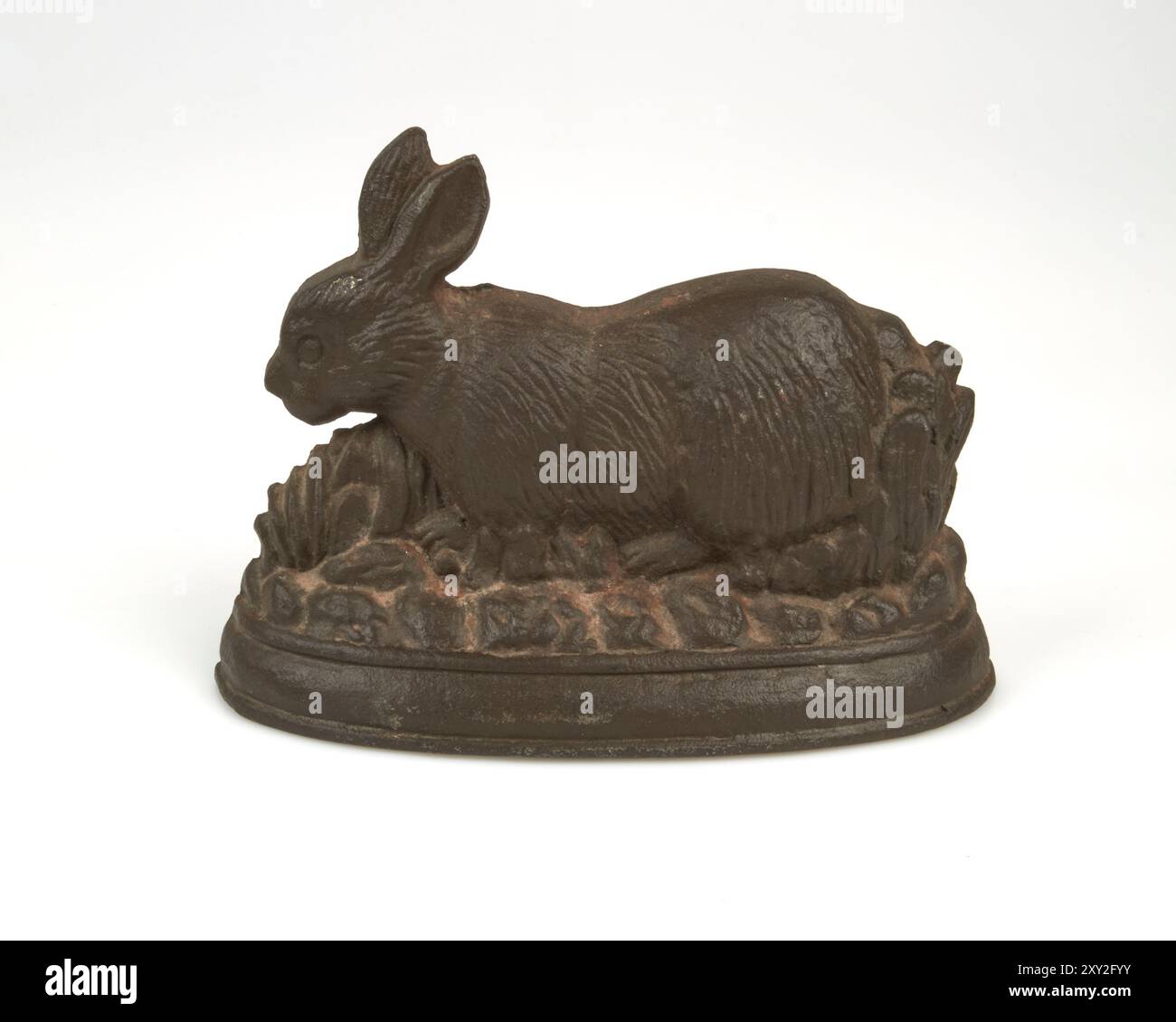 Vintage rabbit cast iron doorstop Stock Photo - Alamy