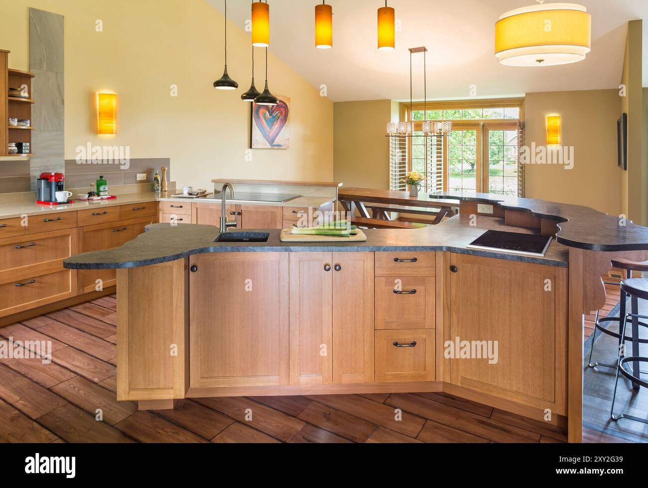 Doors open on both sides of unique kitchen island cabinet hi-res stock ...