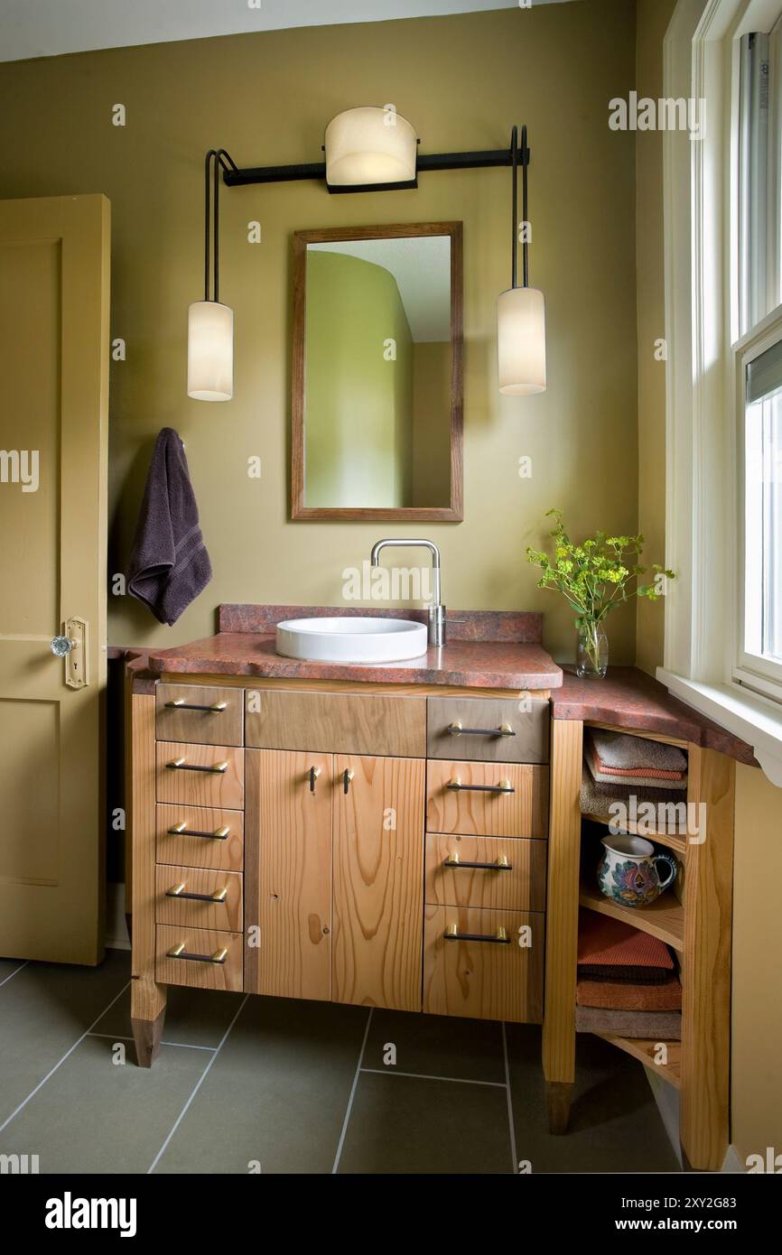 Bathroom showing custom vanity and window Stock Photo - Alamy