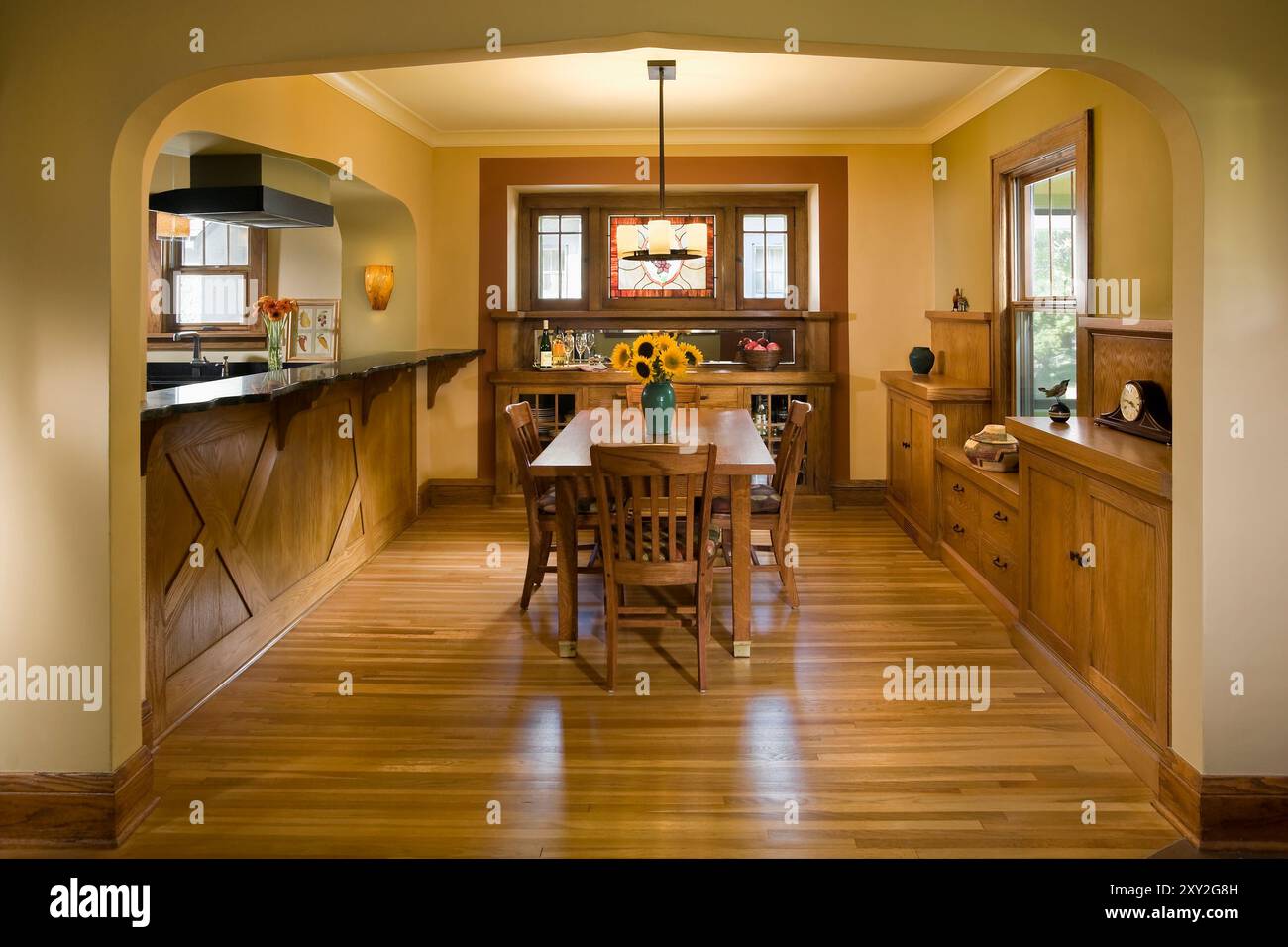 Arts & Crafts dining room with window into kitchen as seen through ...