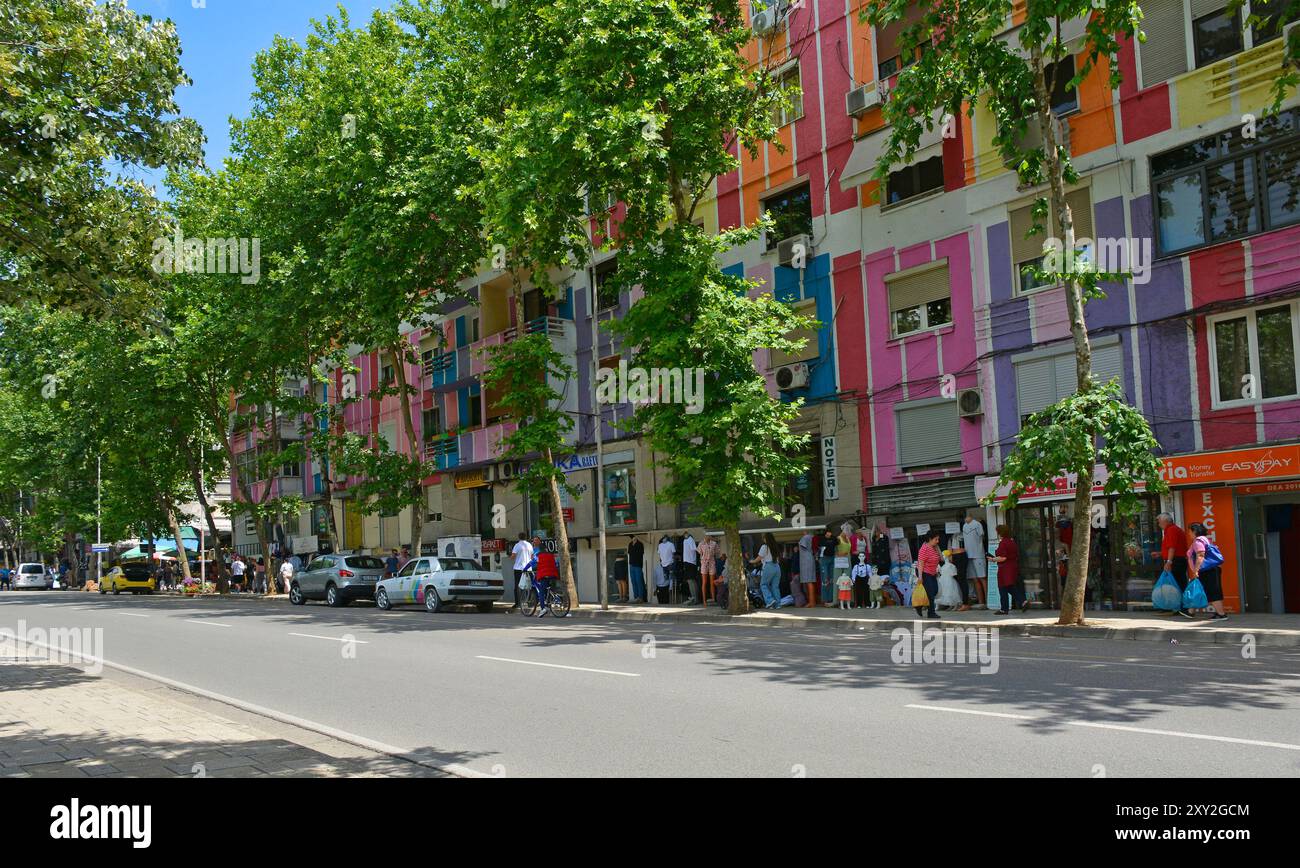 Tirana, Albania - May 30th 2024. Colourful buildings on the tree-lined ...