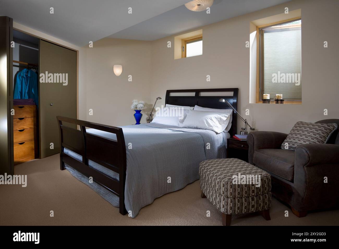 Basement bedroom with one small window and one large egress window ...