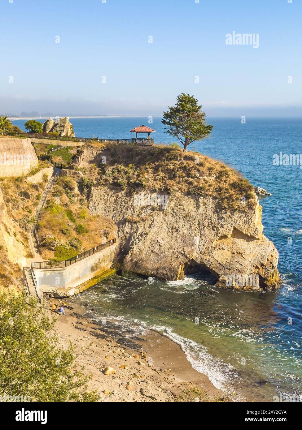 Cliffside gazebo overlooking the ocean with a secluded beach below ...