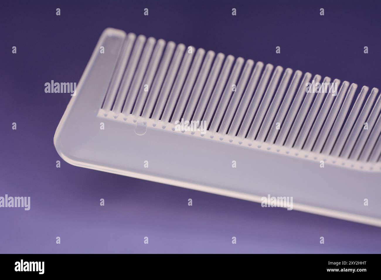 Concept of a transparent hair comb isolated Stock Photo - Alamy
