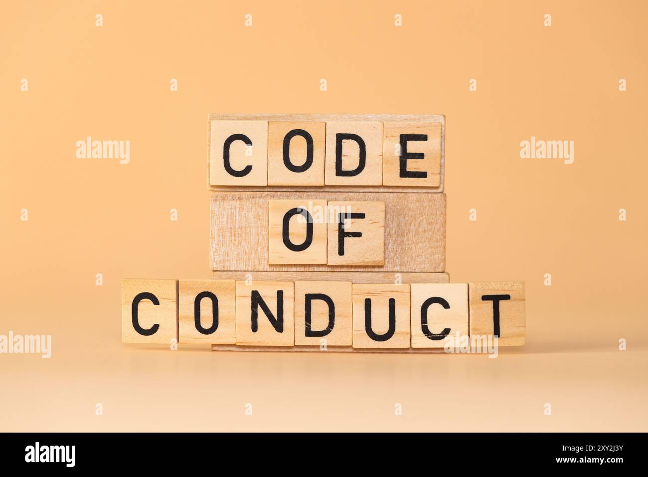 Business and code of conduct concept, sets wooden blocks with words ... Business and code of conduct concept, sets wooden blocks with words ...