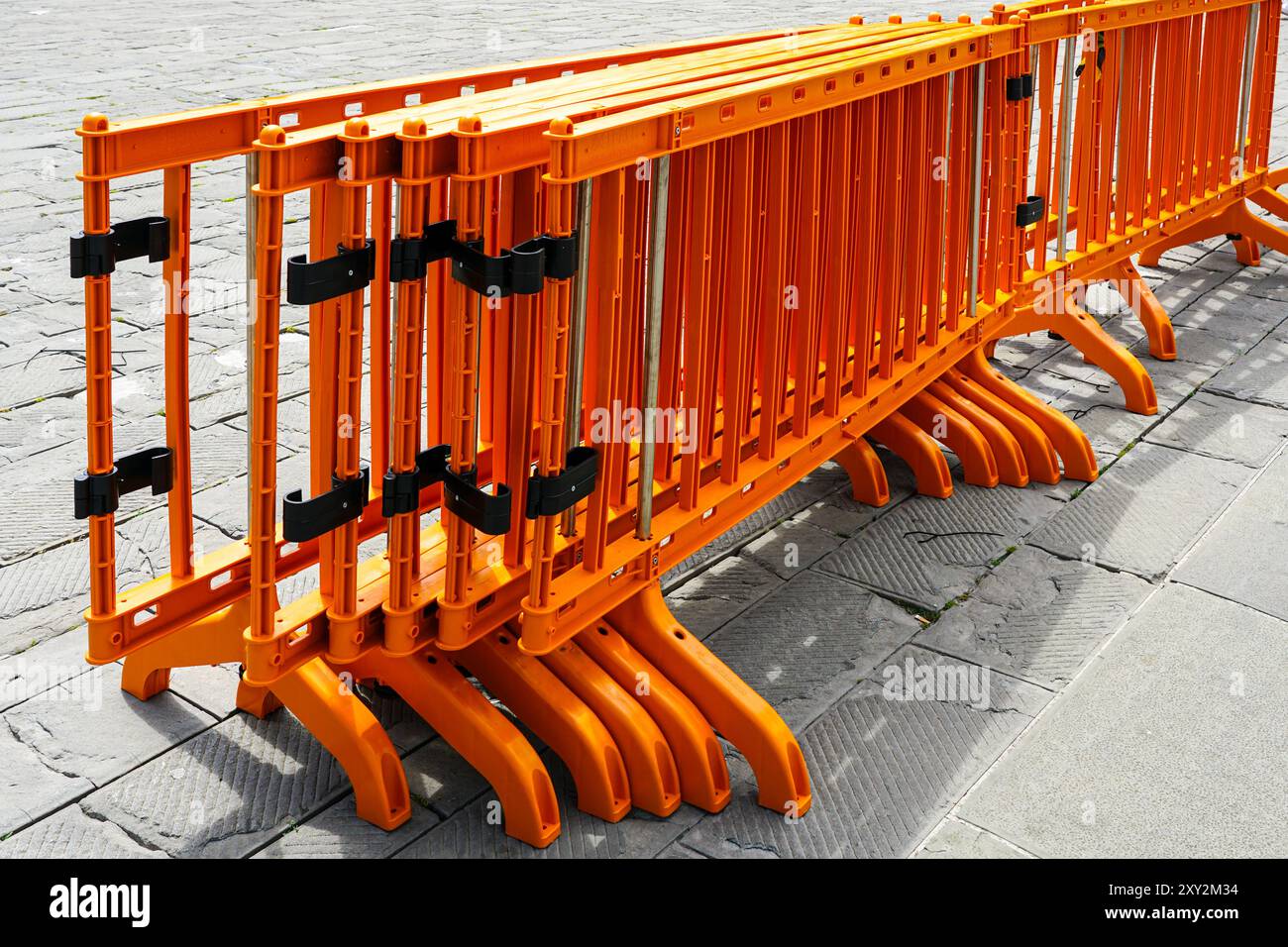 Movable foldable temporary orange plastic lightweight barrier sections ...