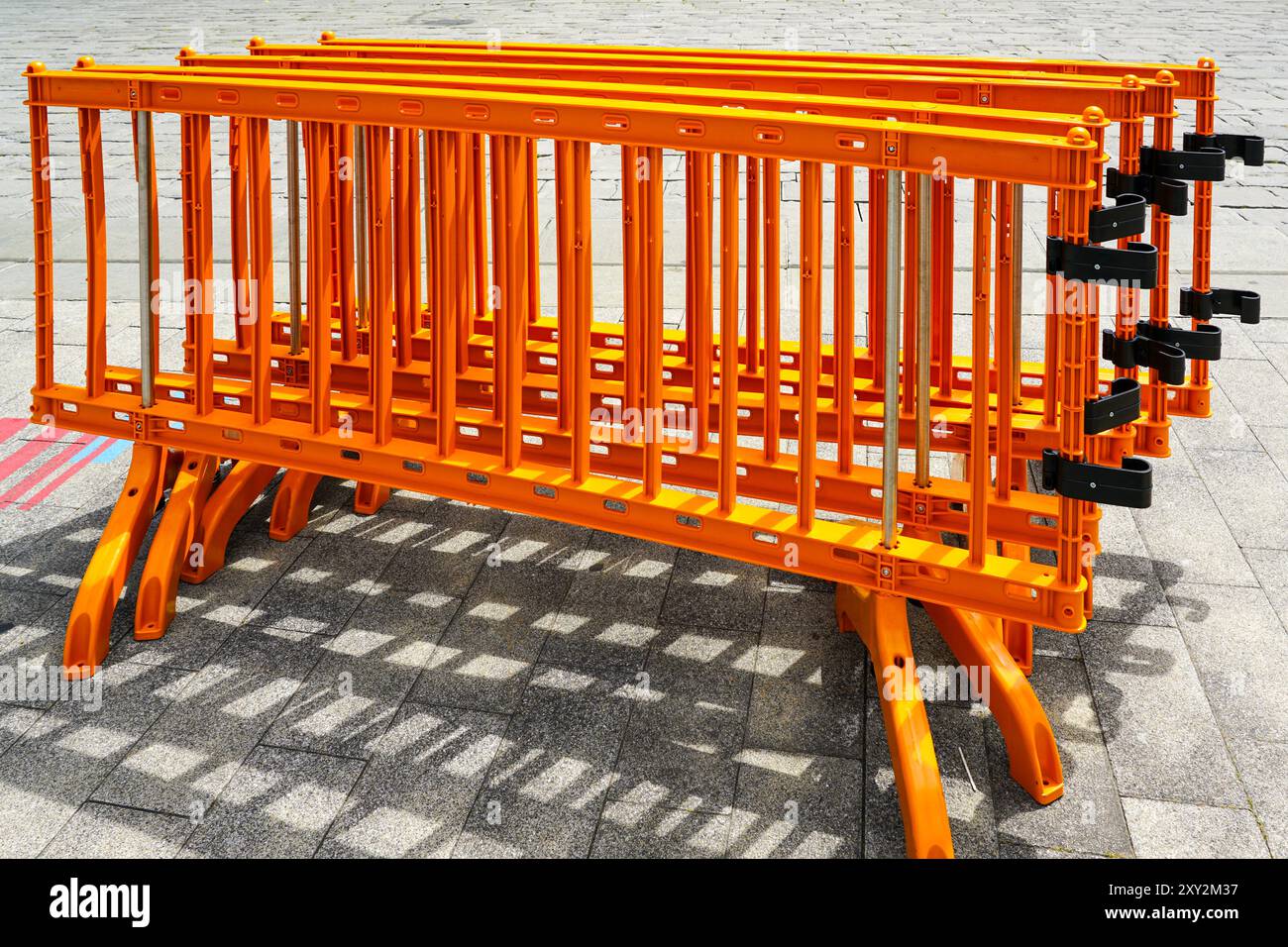 Movable foldable temporary orange plastic lightweight barrier sections ...