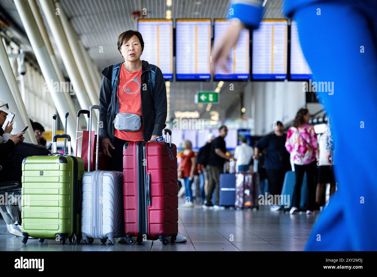 SCHIPHOL - Passengers at Schiphol. of Schiphol Airport ahead of the ...