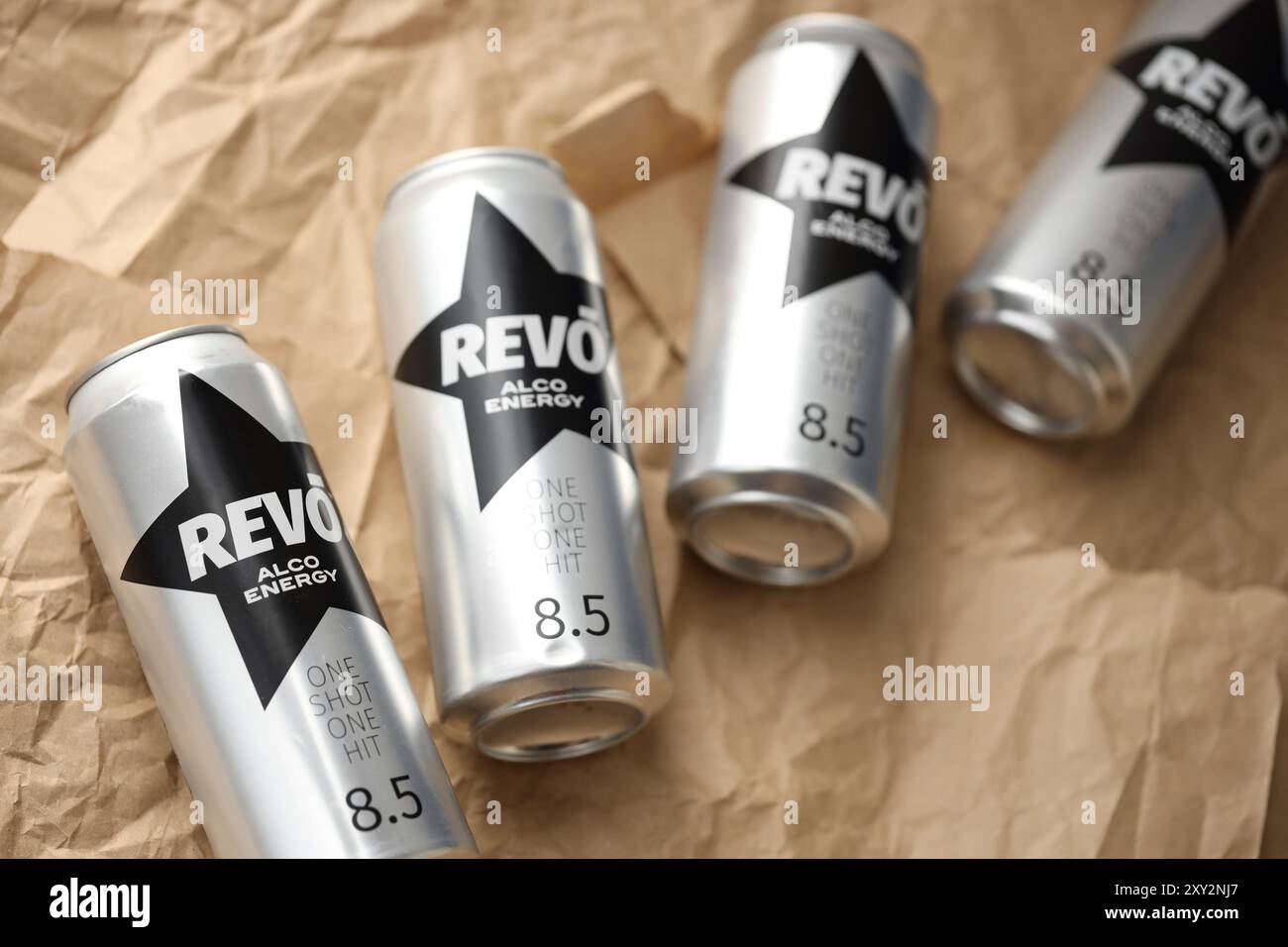 KYIV, UKRAINE - APRIL 20, 2024 Cans of Revo alco energy drink in new ...