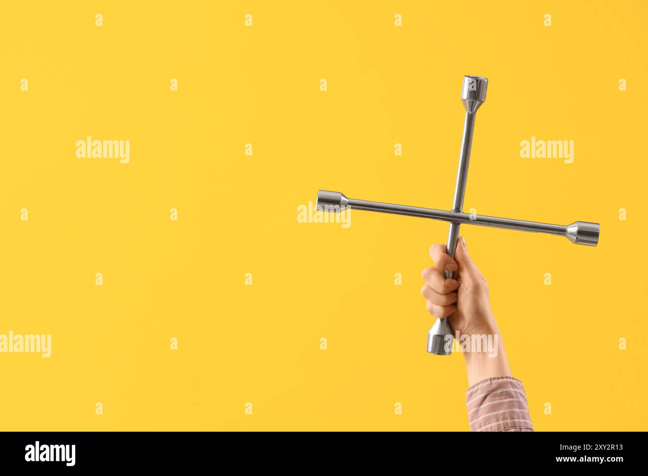 Yellow female building wrench hi-res stock photography and images - Alamy