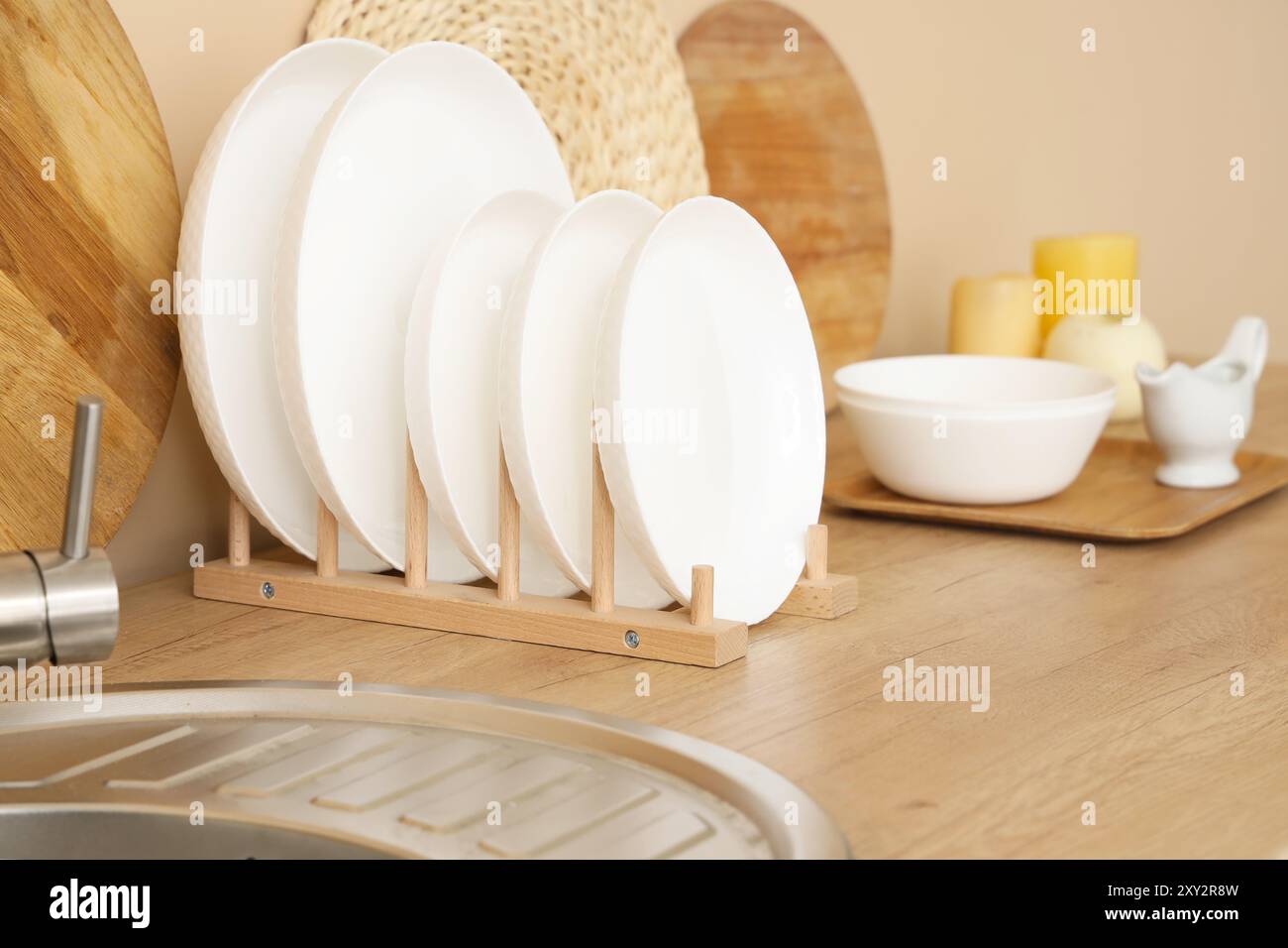 Kitchen counter with plate rack, clean dishes and cutting boards Stock ...