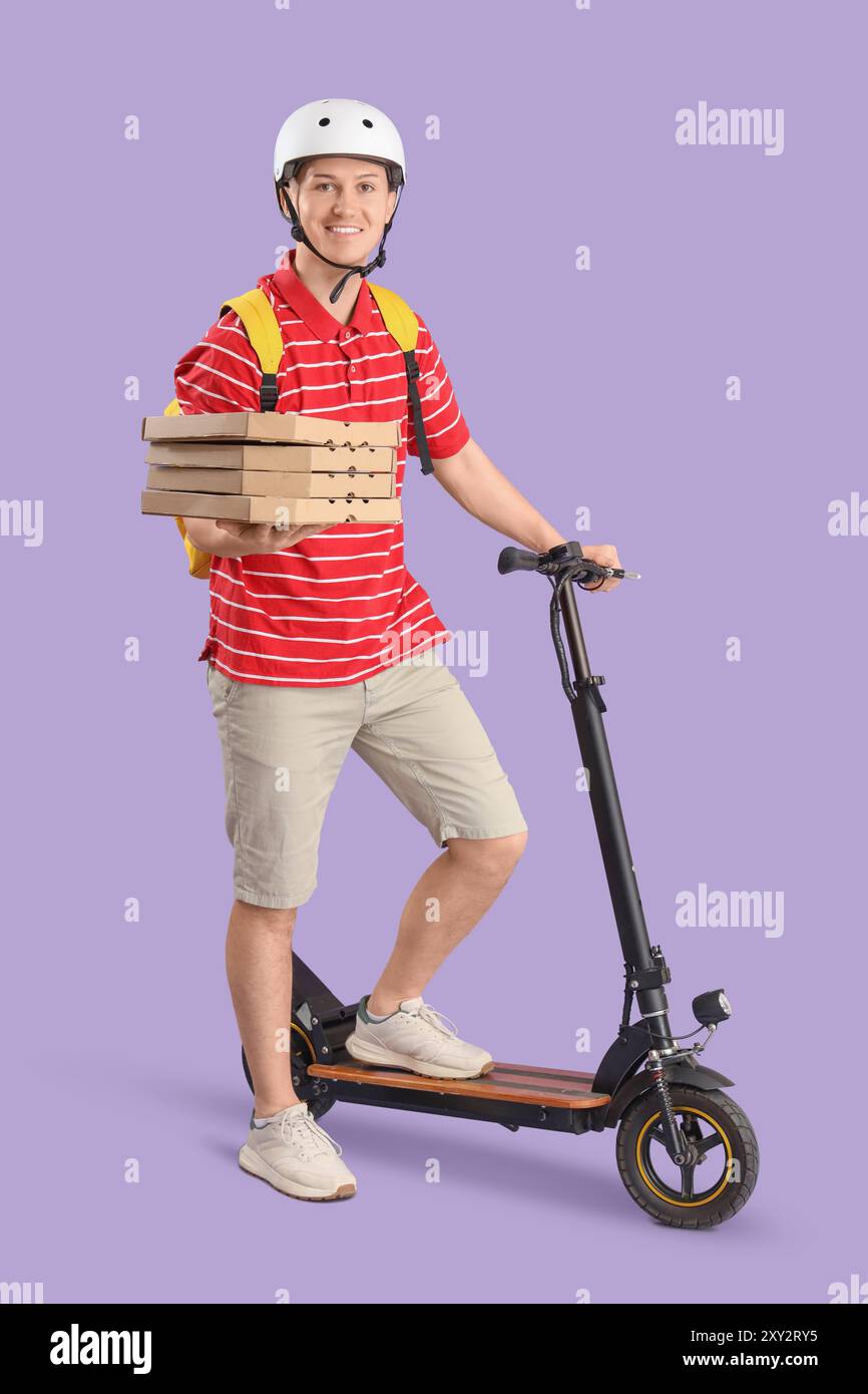 Male courier with pizza boxes and kick scooter on lilac background ...