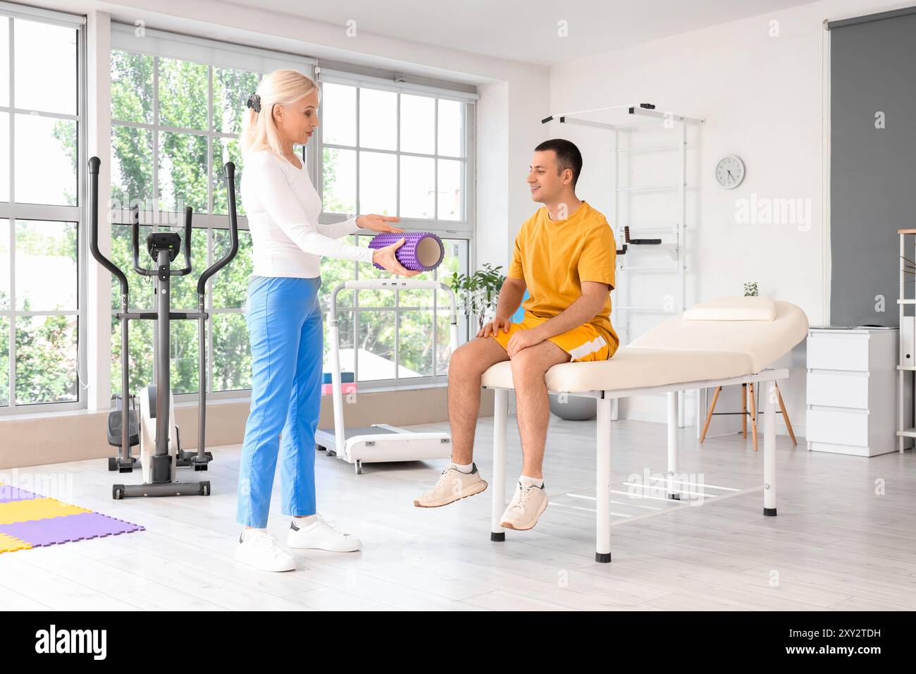 Young physiotherapist woman giving hi-res stock photography and images ...