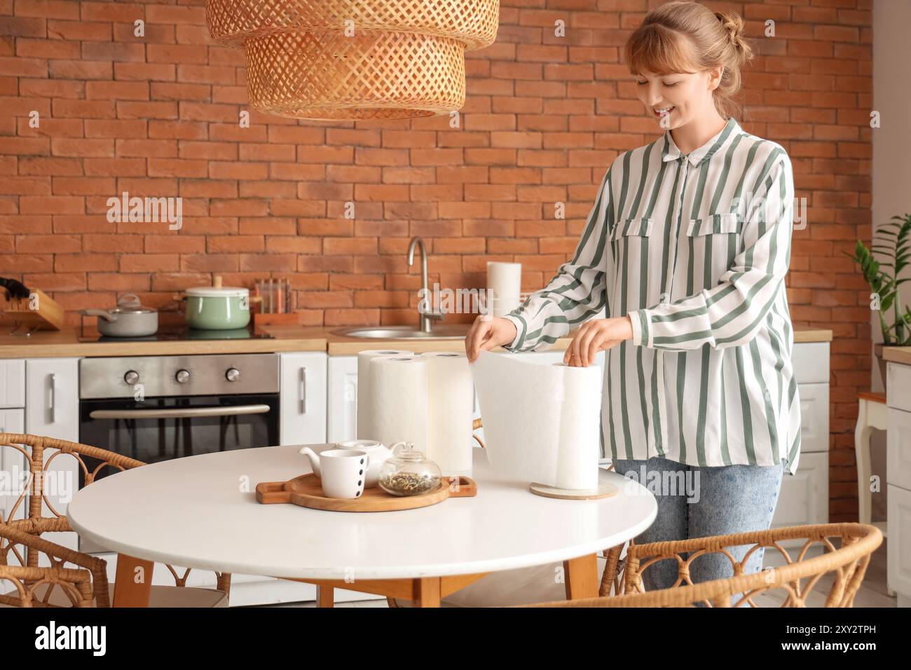 Young woman taking paper hi-res stock photography and images - Alamy