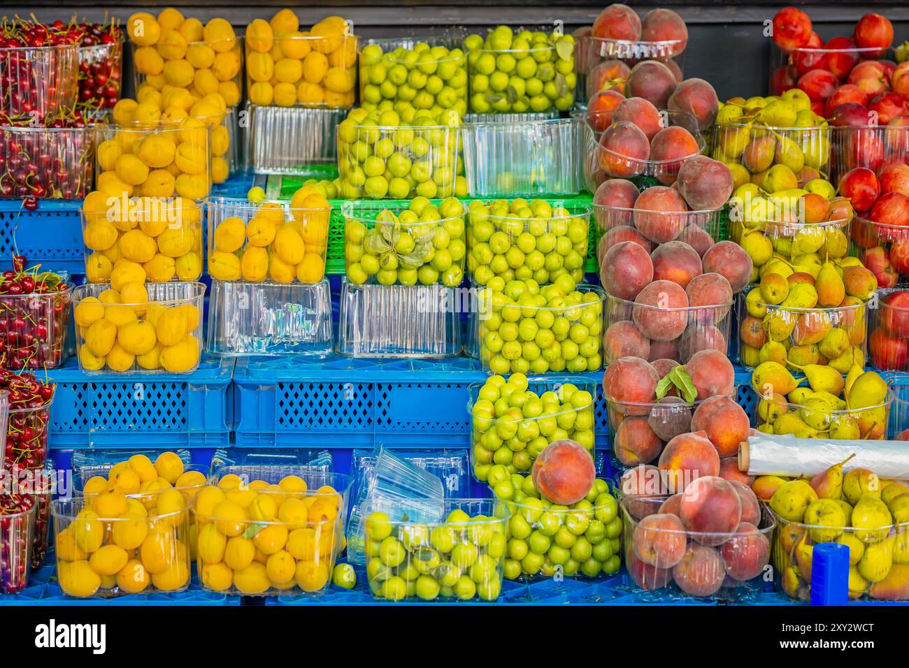Colorful display of fresh fruits at local market showcasing various ...