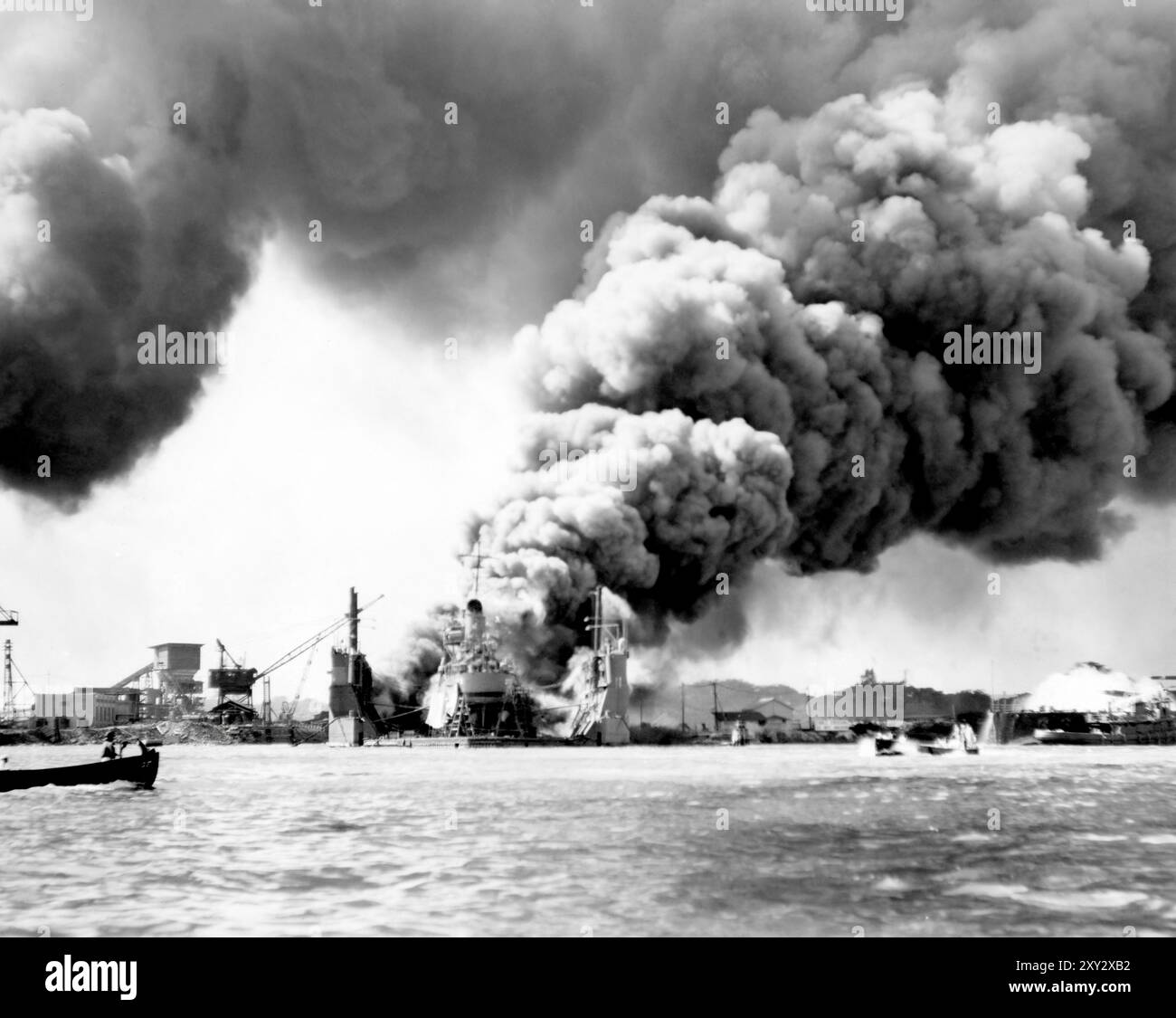 USS Shaw (DD-373) burning in floating drydock YFD-2 at Pearl Harbor ...
