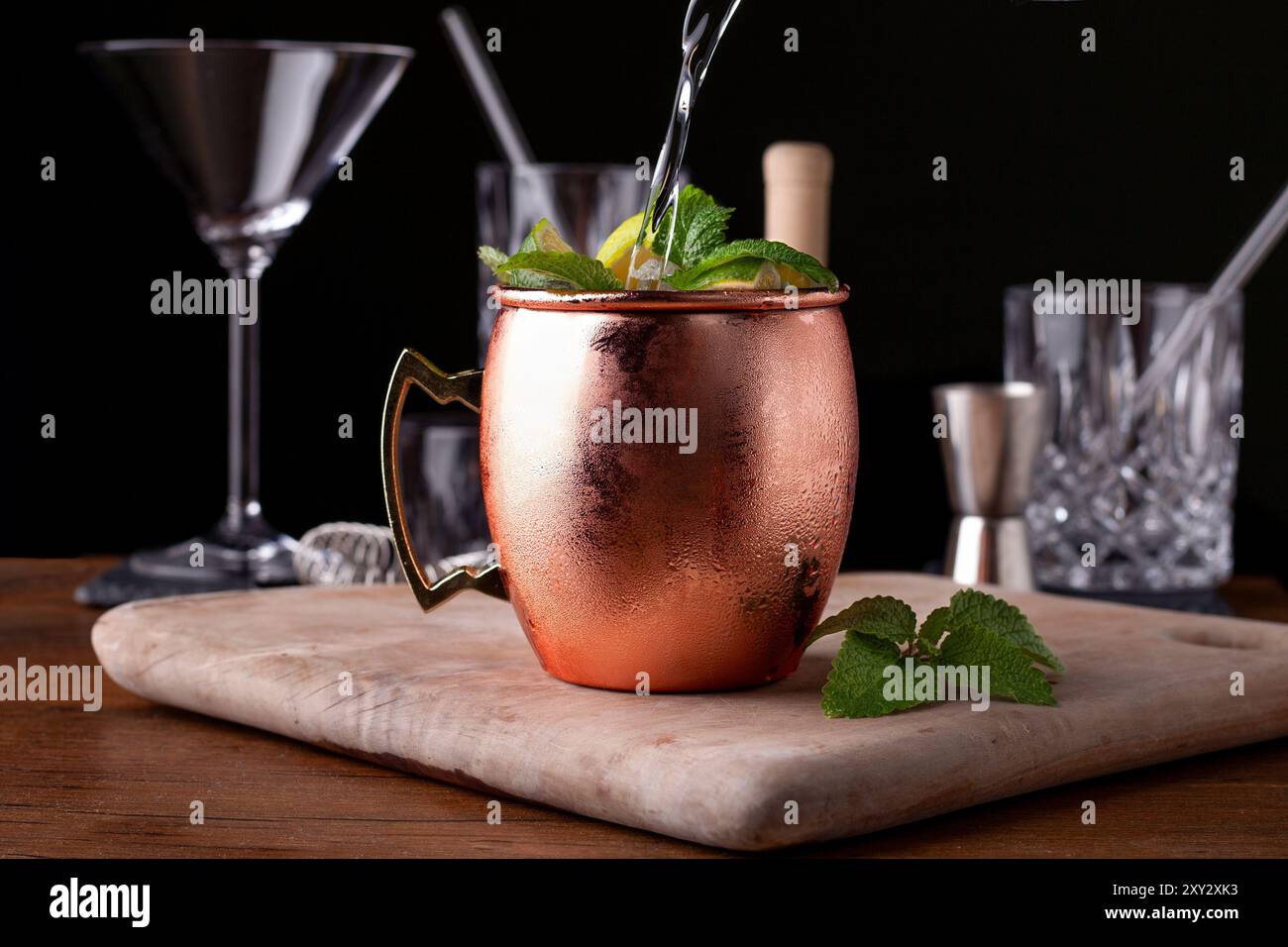Moscow Mule standing on a cutting board. Bar equipment Stock Photo - Alamy