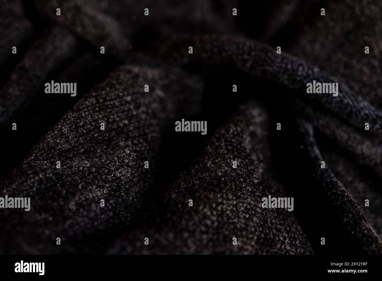 Weaving design with wavy shapes.Black background of textured fabric ...