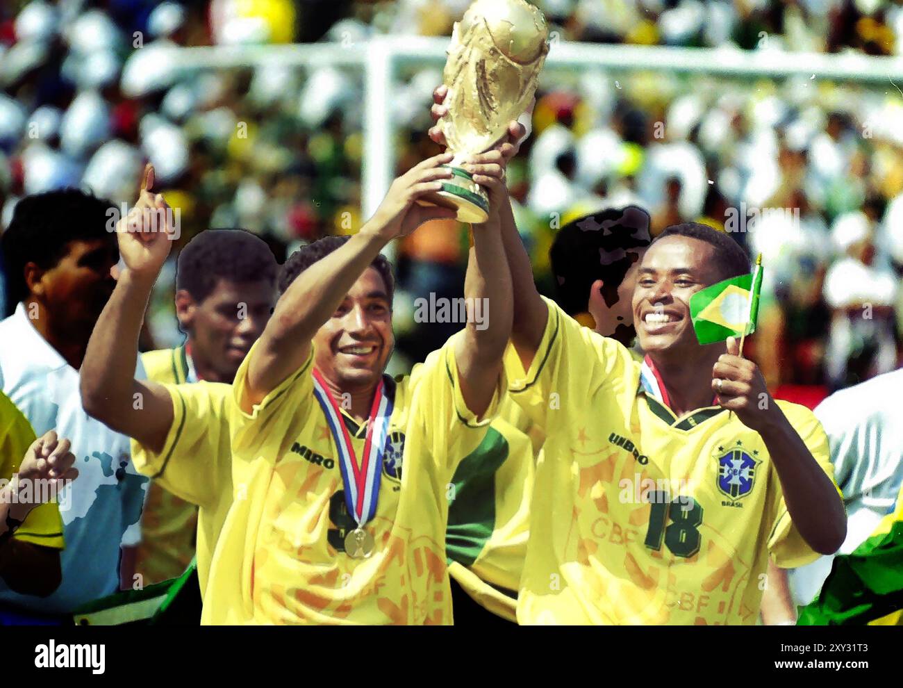 Zinho and Leonardo with the 1994 World Cup trophy Stock Photo - Alamy