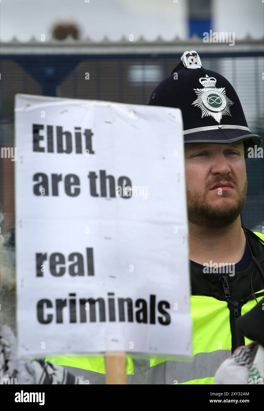 Shenstone, England, UK. 27th Aug, 2024. A protester holds a sign saying ...