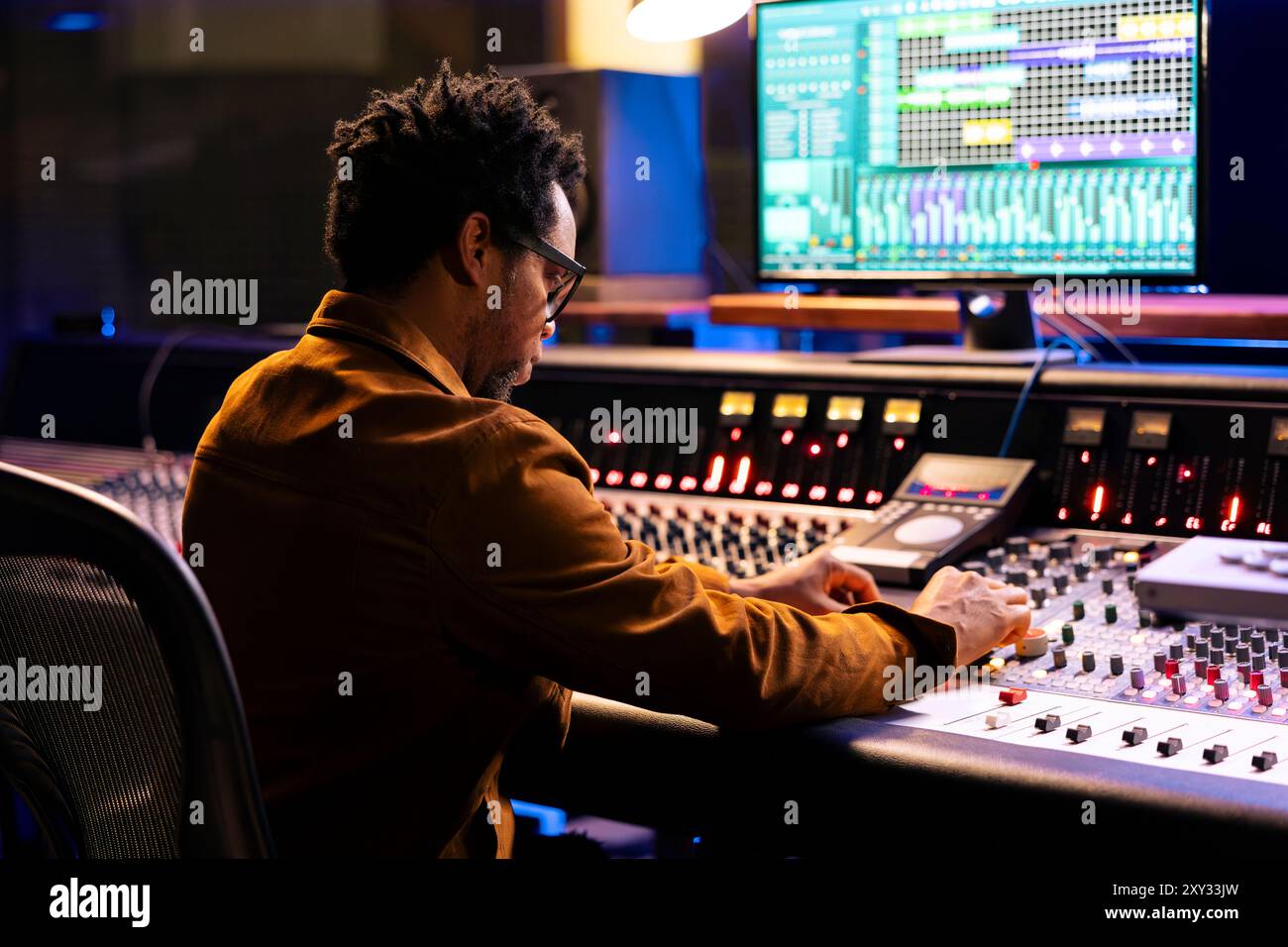 African american record composer creating new music for an album ...