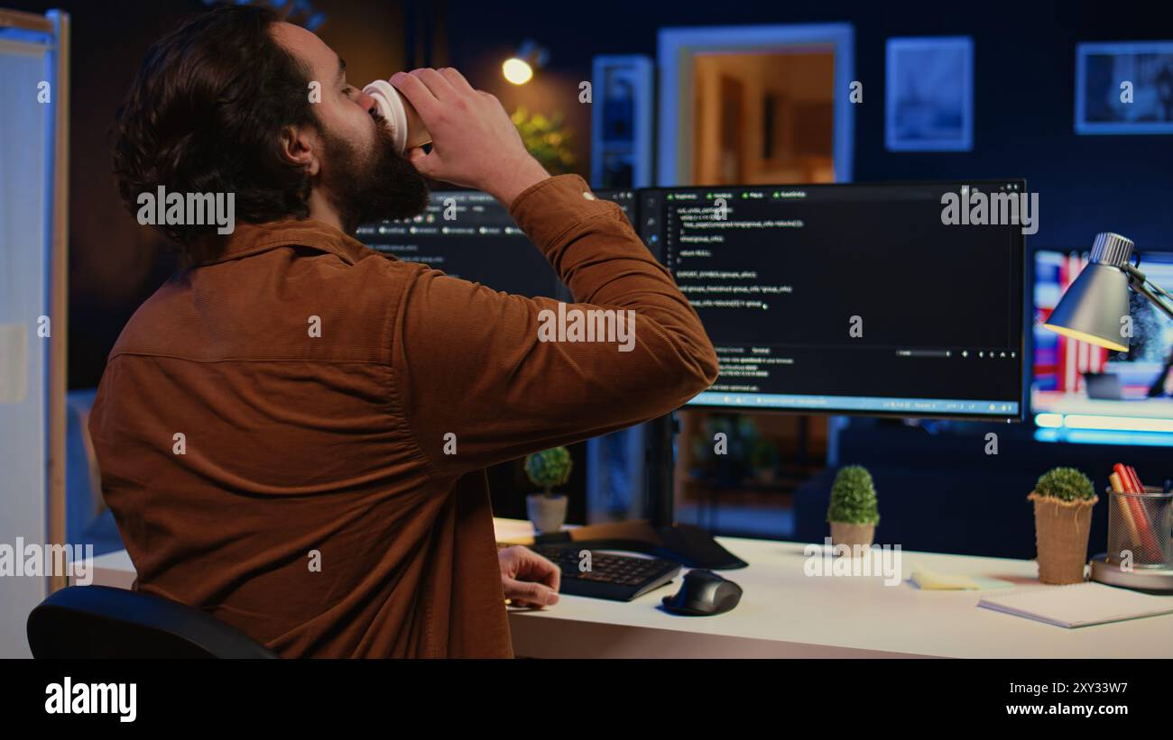 Remote software developer arriving in personal office at home, starting ...