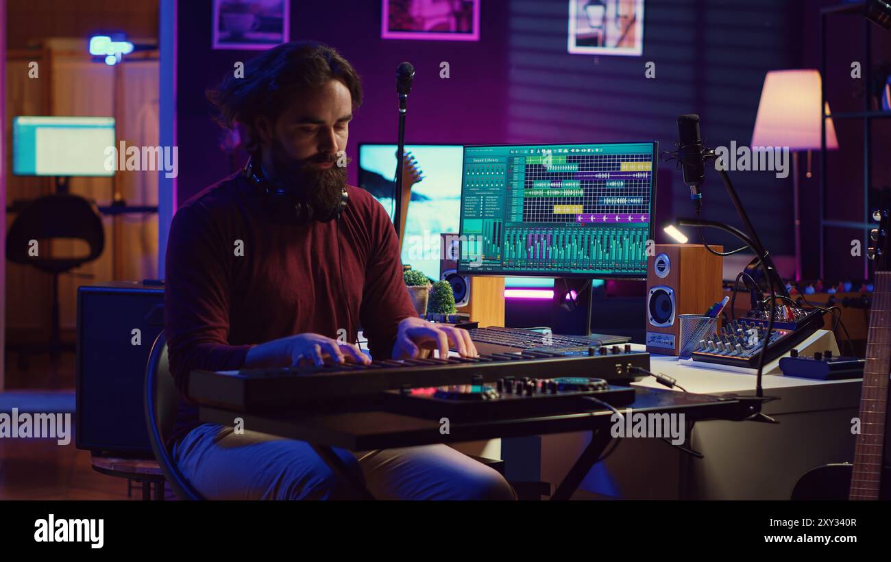Sound Engineer Playing Electronic Piano Keyboard And Recording Sounds