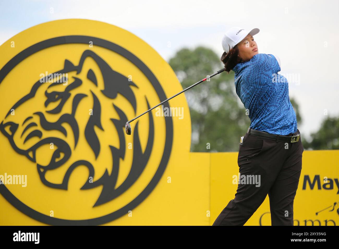 Ng Jing Xuan takes a shot during day one at Maybank Asean Qualifier ...