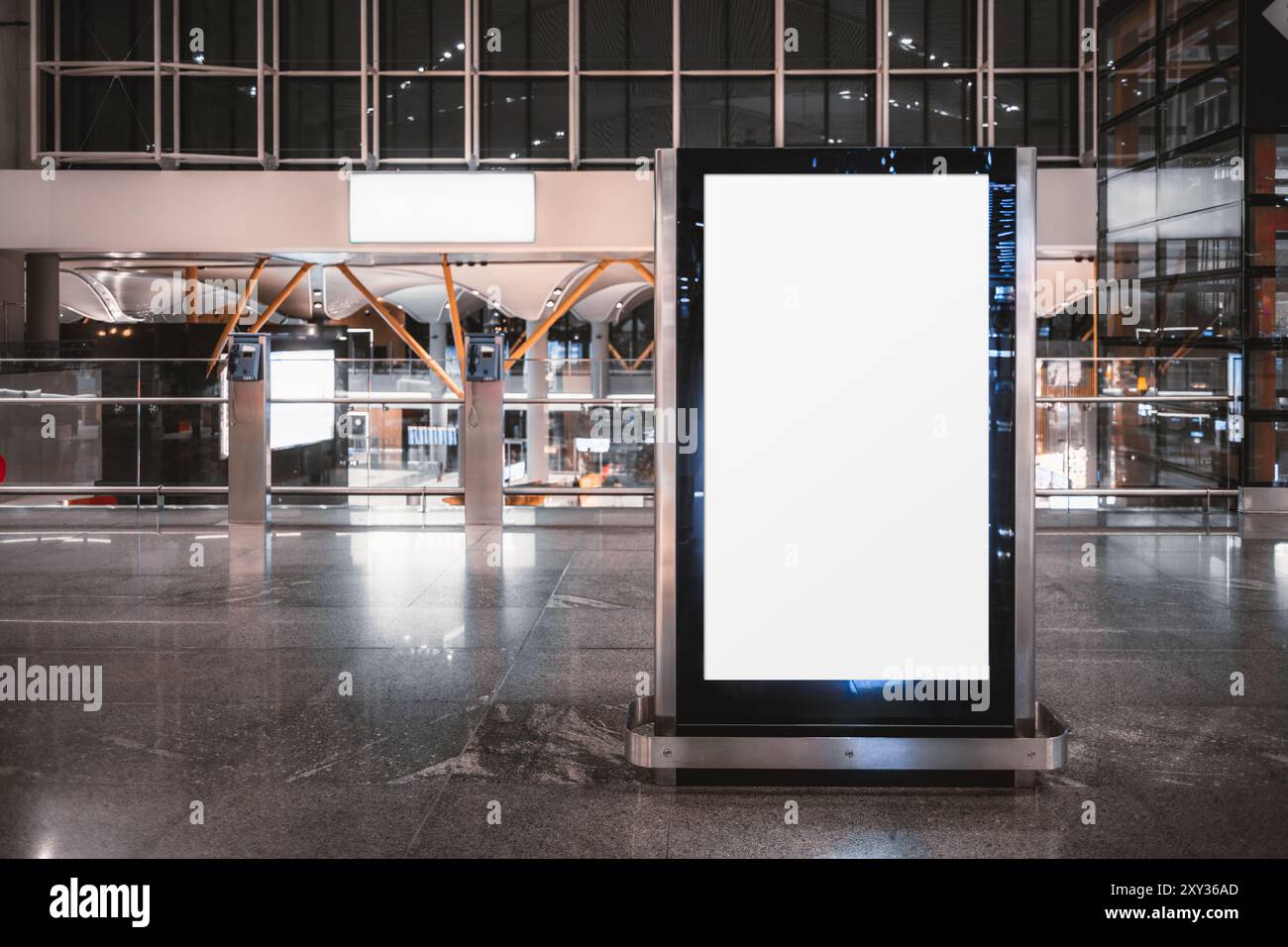 Digital advertising display board in a modern, spacious airport ...